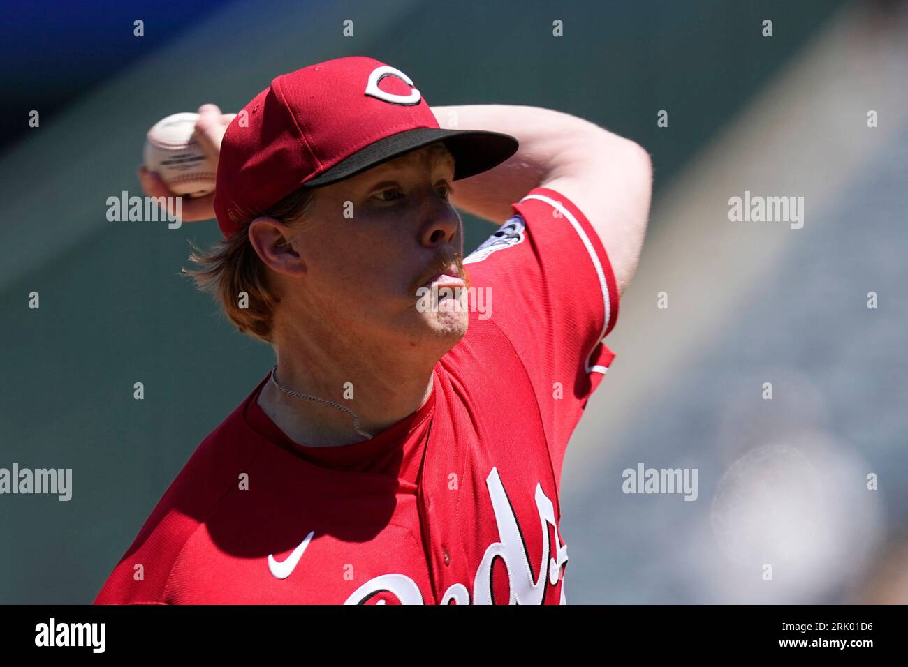 Cincinnati Reds starting pitcher Andrew Abbott throws to the plate ...