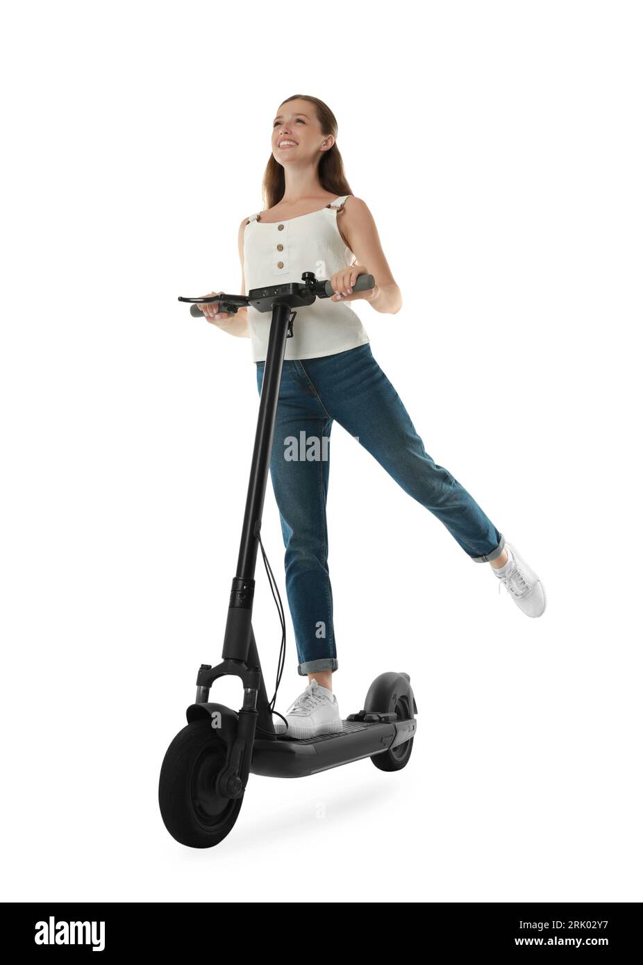 Happy woman riding modern electric kick scooter on white background ...