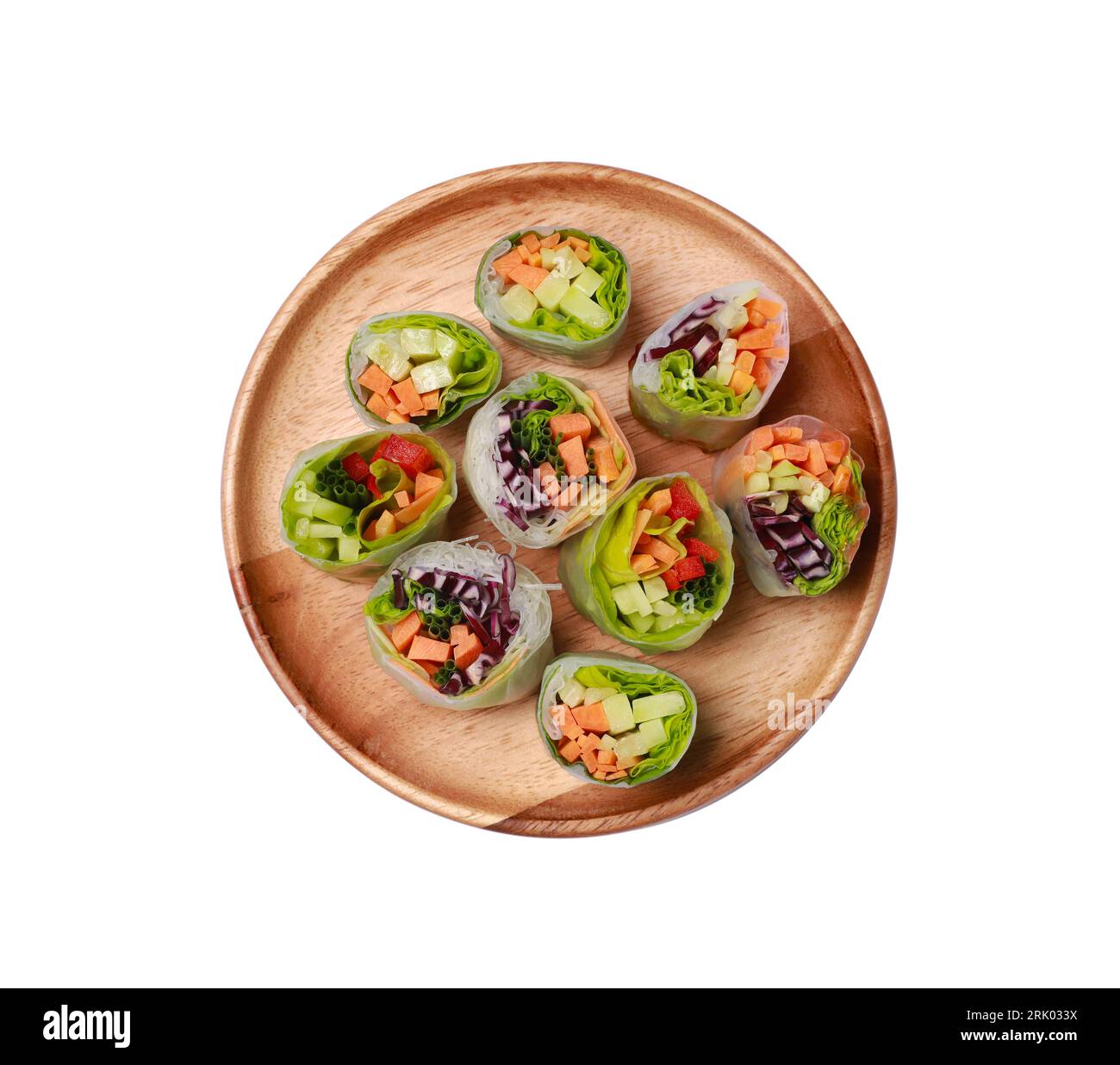 Plate of different delicious spring rolls wrapped in rice paper ...