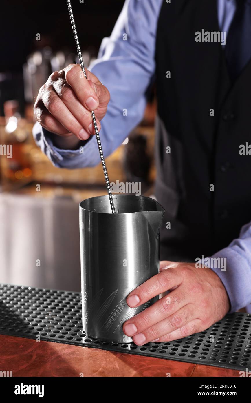 Mixing cocktail in jug hi-res stock photography and images - Alamy