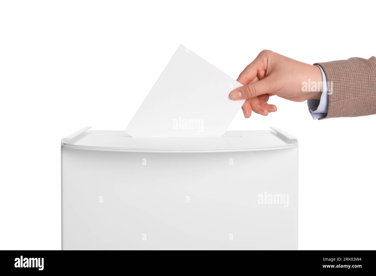 Woman putting her vote into ballot box on white background, closeup ...