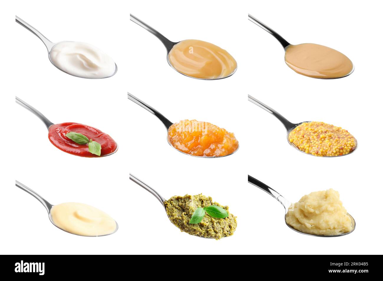 Set of spoons with different food isolated on white Stock Photo - Alamy