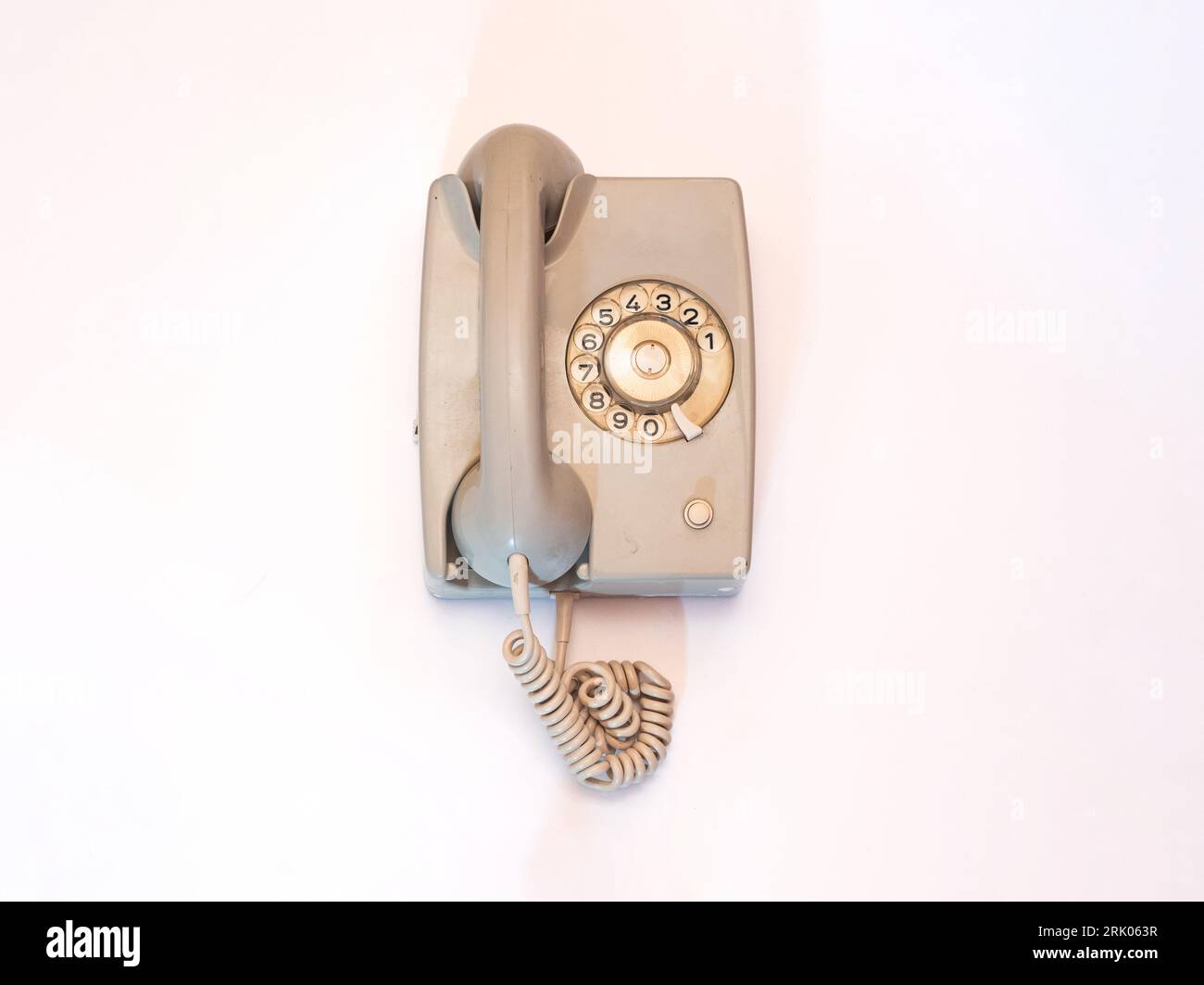 A grey green rotary phone is isolated at a white background Stock Photo ...