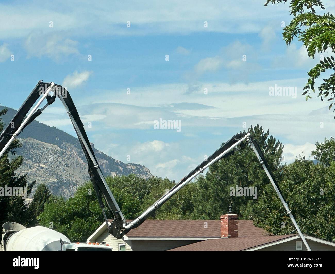 Pumping cement through a long industrial tube make concrete work easier ...