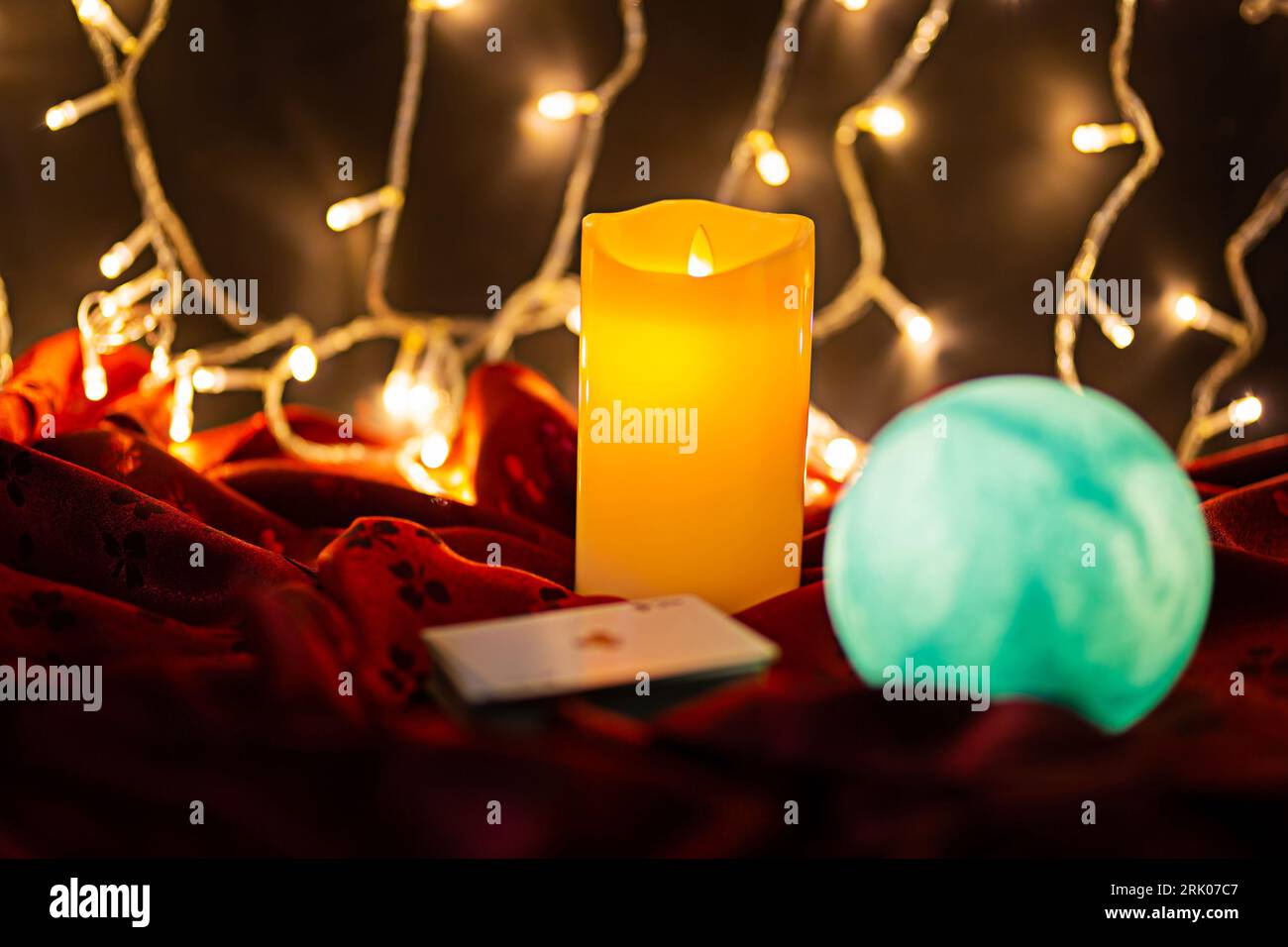 Occulture concept, candle lighting, fortune telling and crystal ball ...