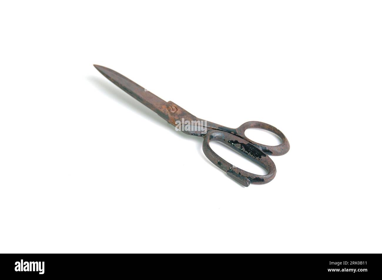 old and rusty scissors (around 1967) on white Background Stock Photo ...
