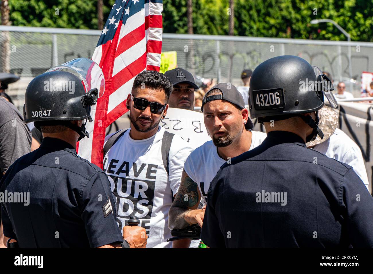 Los Angeles, USA. 22nd Aug, 2023. Proud Boy Adam Kiefer and an unknown ...