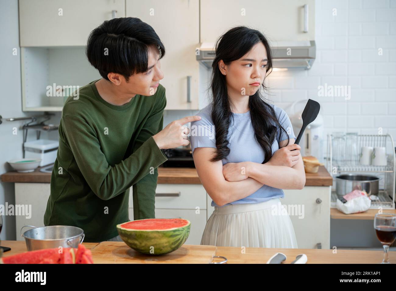 A cute, clingy young Asian boyfriend is asking for forgiveness from his ...