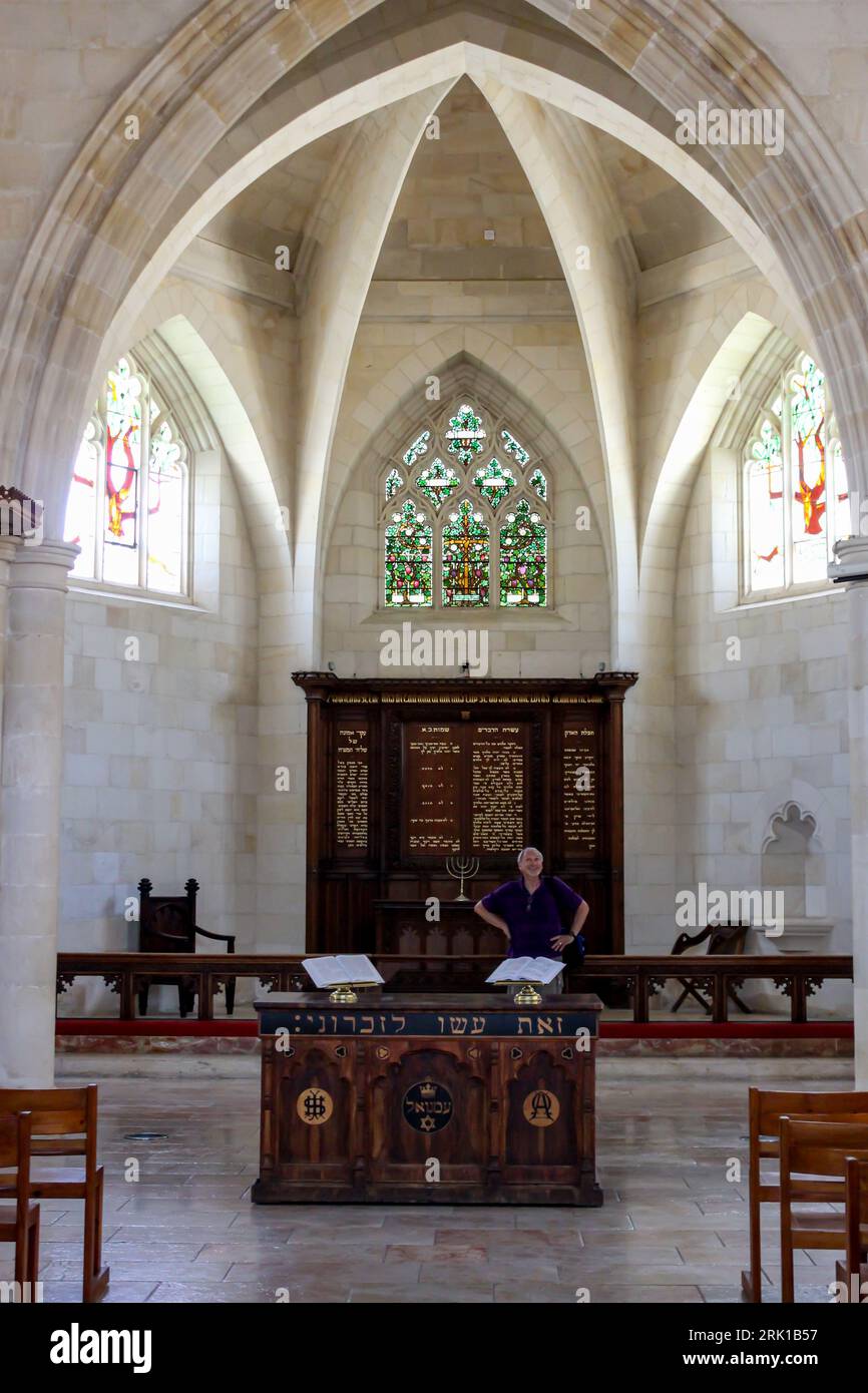 A man stands at the altar in the sanctuary of Christ Church Jerusalem ...