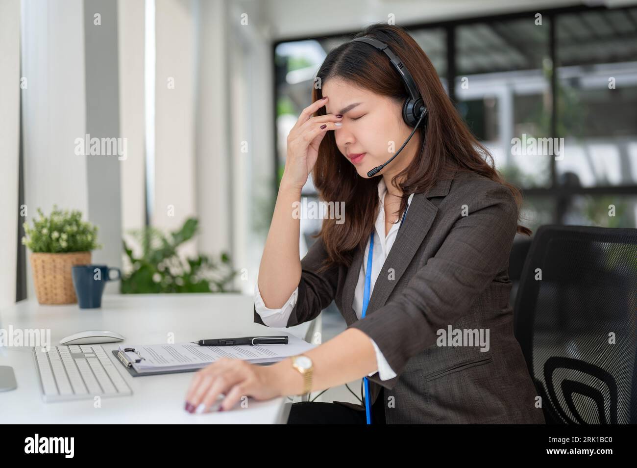 Stressed call center operator hi-res stock photography and images - Alamy