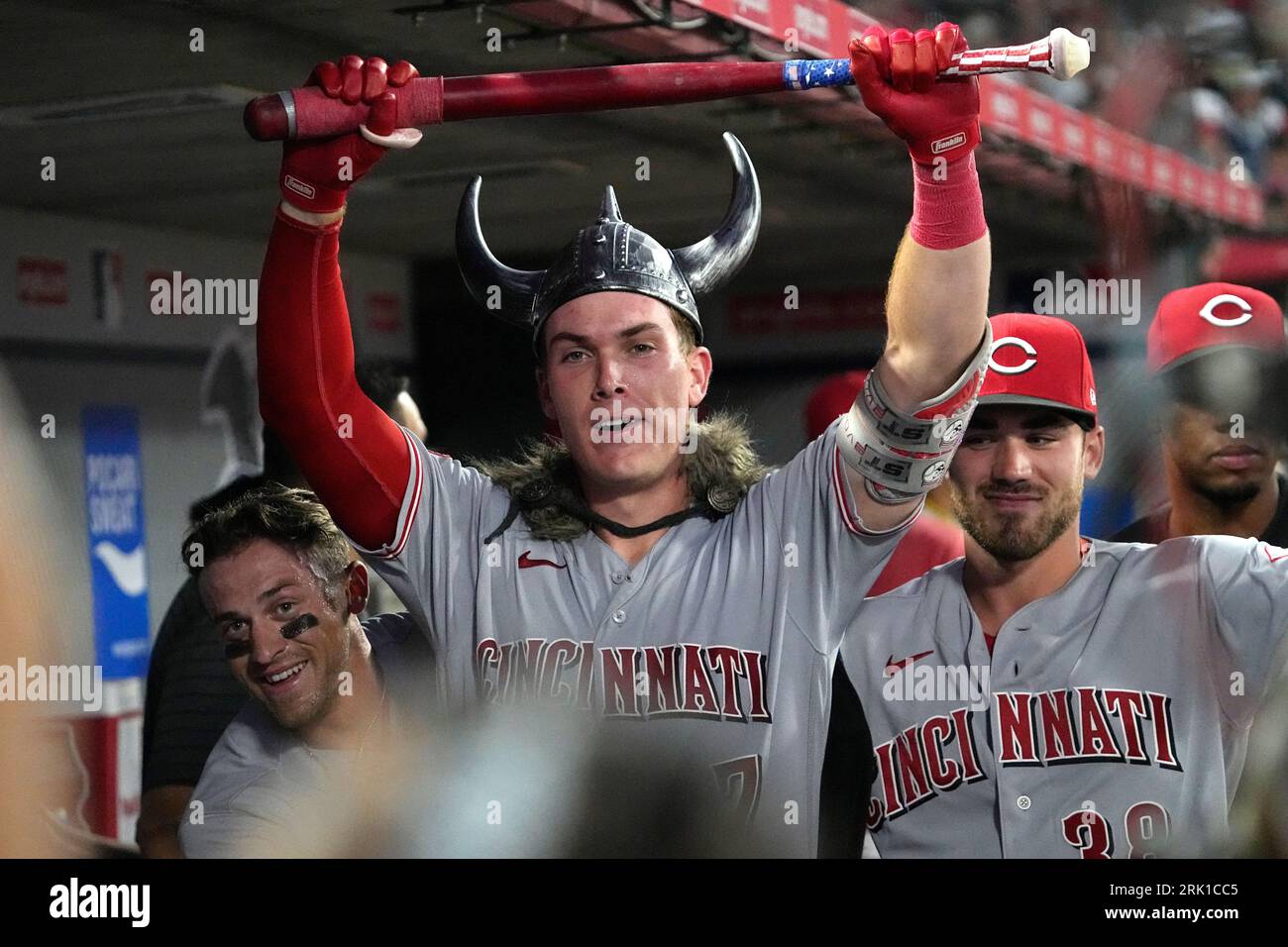 Cincinnati Reds' Tyler Stephenson, center, celebrates with TJ Friedl ...