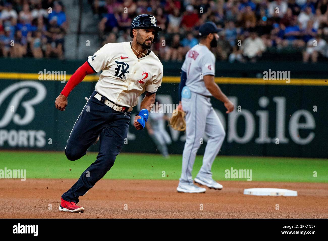 Texas Rangers second baseman Marcus Semien (2) sprints toward third ...