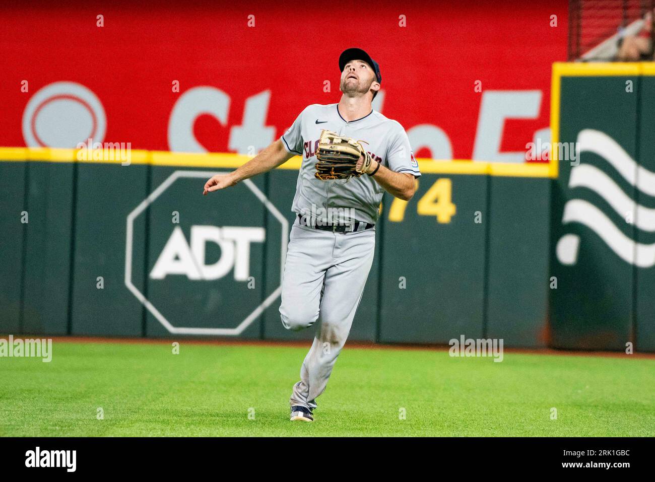 Cleveland Guardians' right fielder David Fry sprints to catch a fly ...