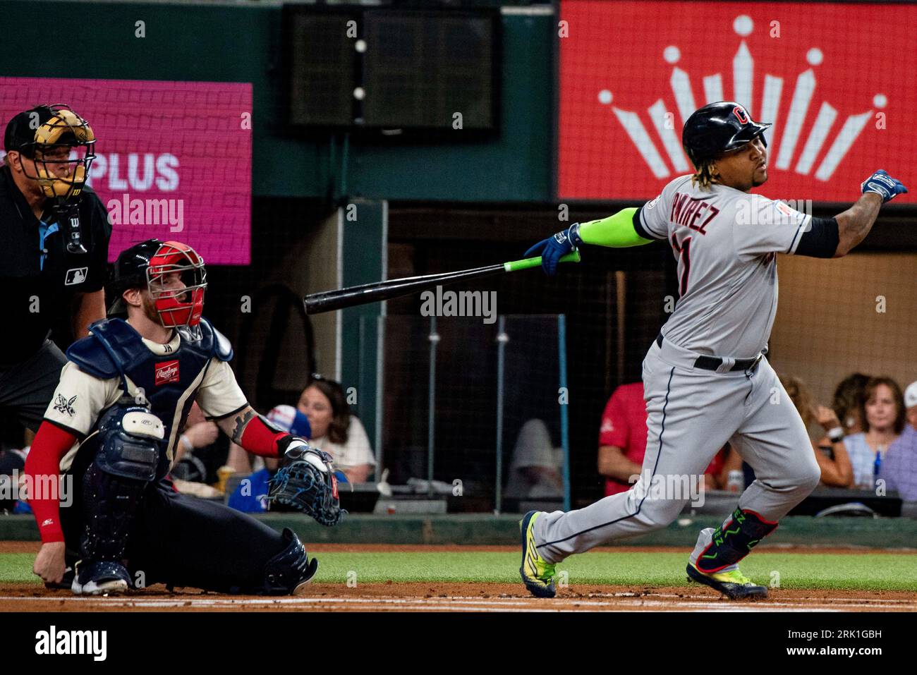 Cleveland Guardians' Jose Ramirez (11) swings at a pitch in the top of ...