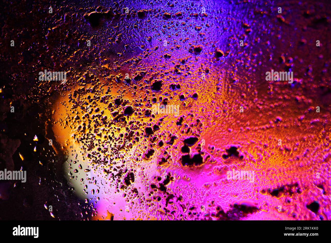 Oil Drops on the Color glass Stock Photo - Alamy