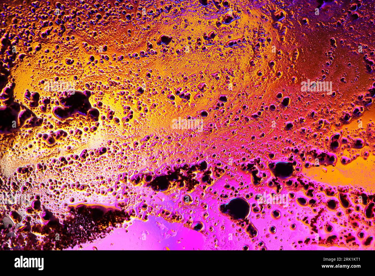 Oil Drops on the Color glass Stock Photo - Alamy