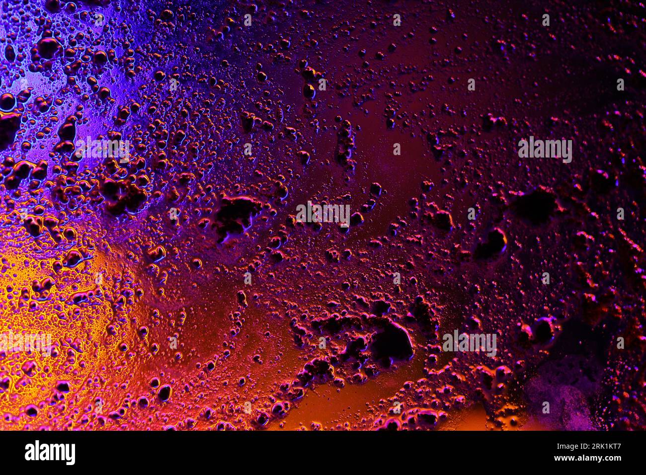 Oil Drops on the Color glass Stock Photo - Alamy