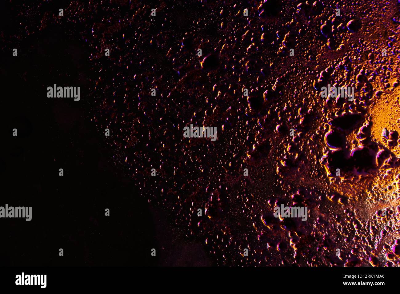 Oil Drops on the Color glass Stock Photo - Alamy