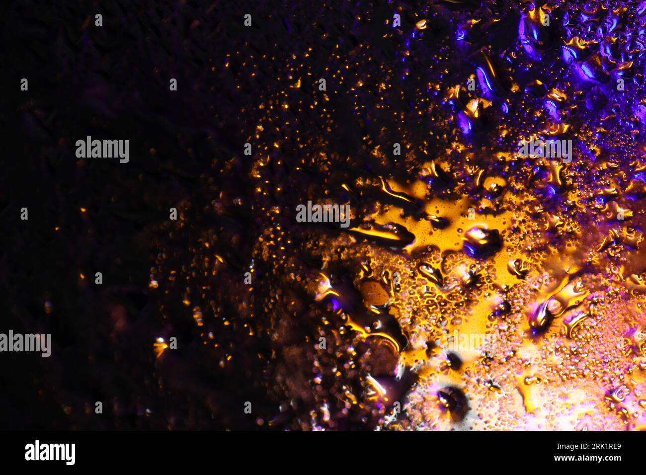 Oil Drops on the Color glass Stock Photo - Alamy