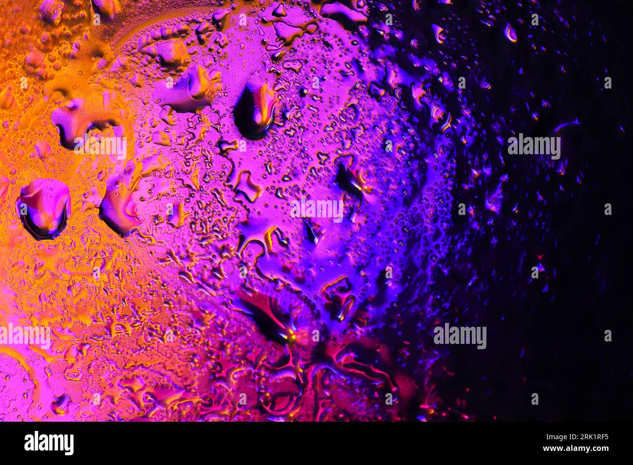 Oil Drops on the Color glass Stock Photo - Alamy