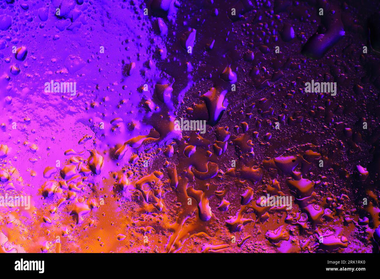 Oil Drops on the Color glass Stock Photo - Alamy