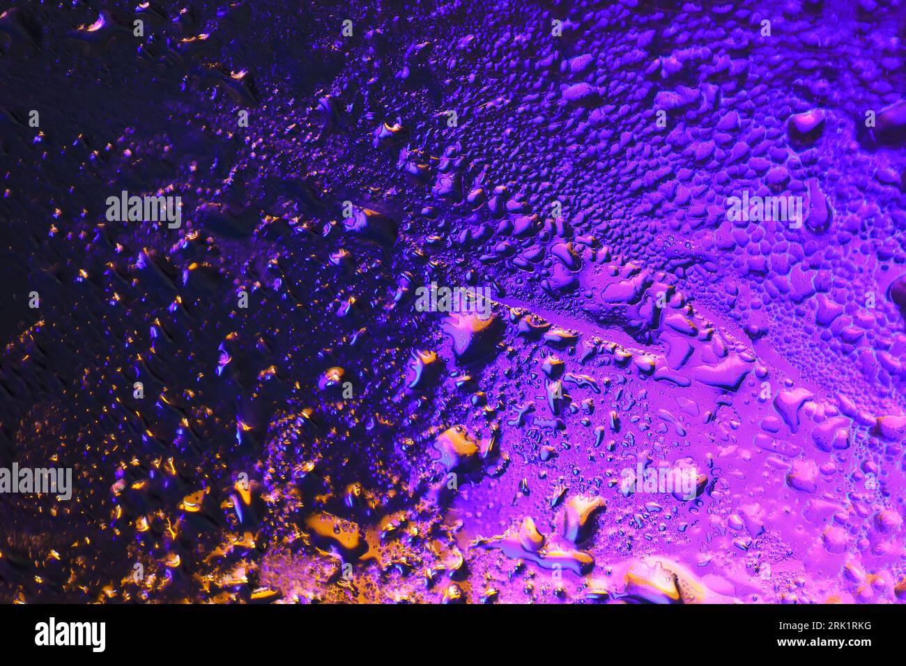 Oil Drops on the Color glass Stock Photo - Alamy