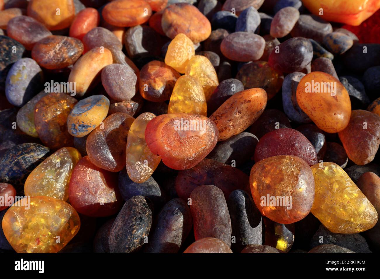 The original stone of beeswax is piled up Stock Photo - Alamy