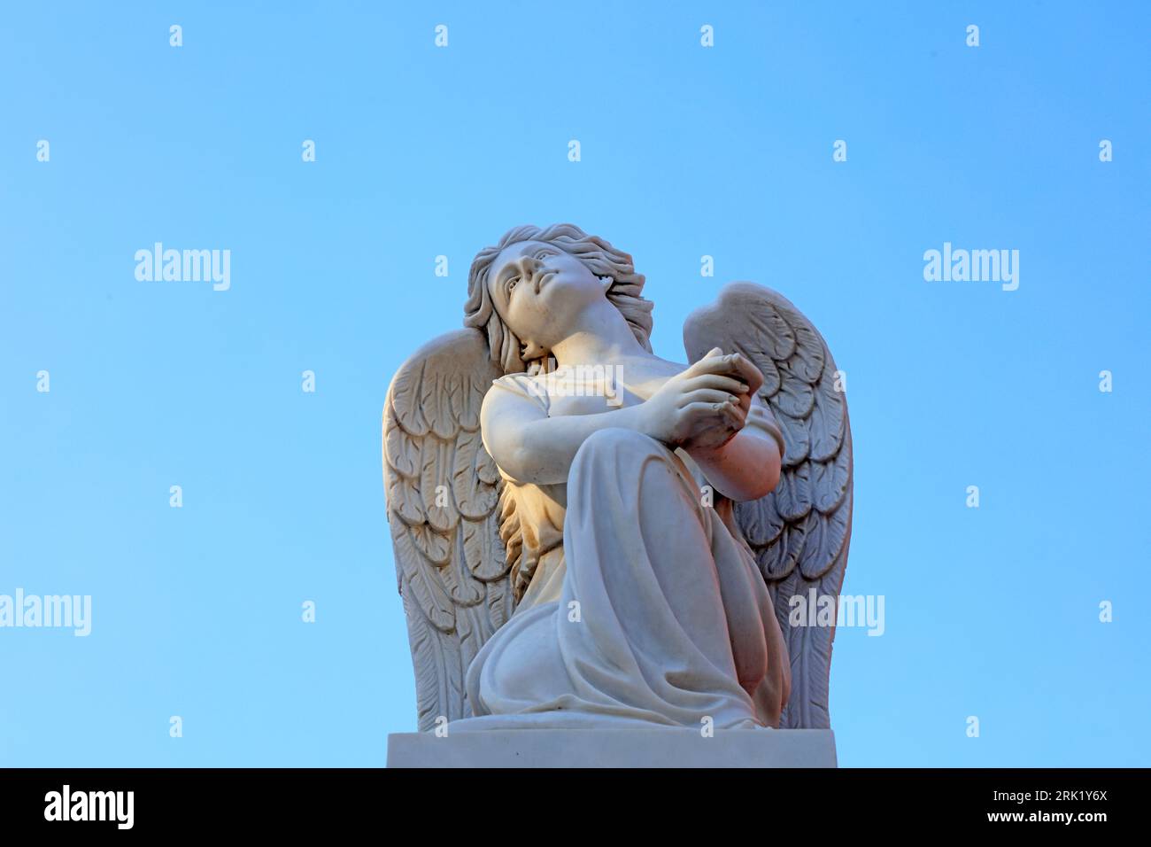 Angel sculpture is in a church Stock Photo - Alamy