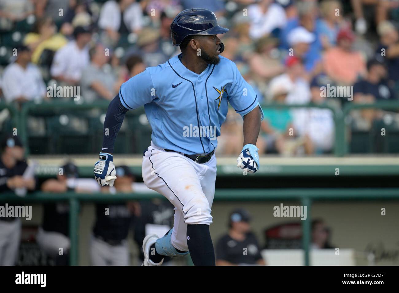 Tampa Bay Rays' Osleivis Basabe runs after hitting a pitch during the ...