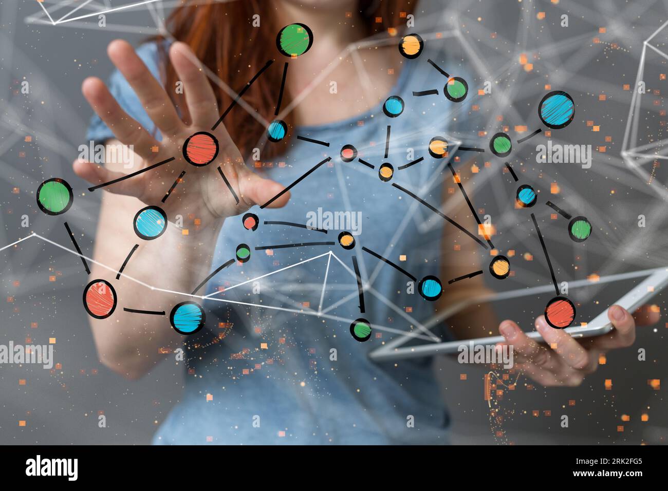 A young female showing a network of data with connecting dots Stock ...
