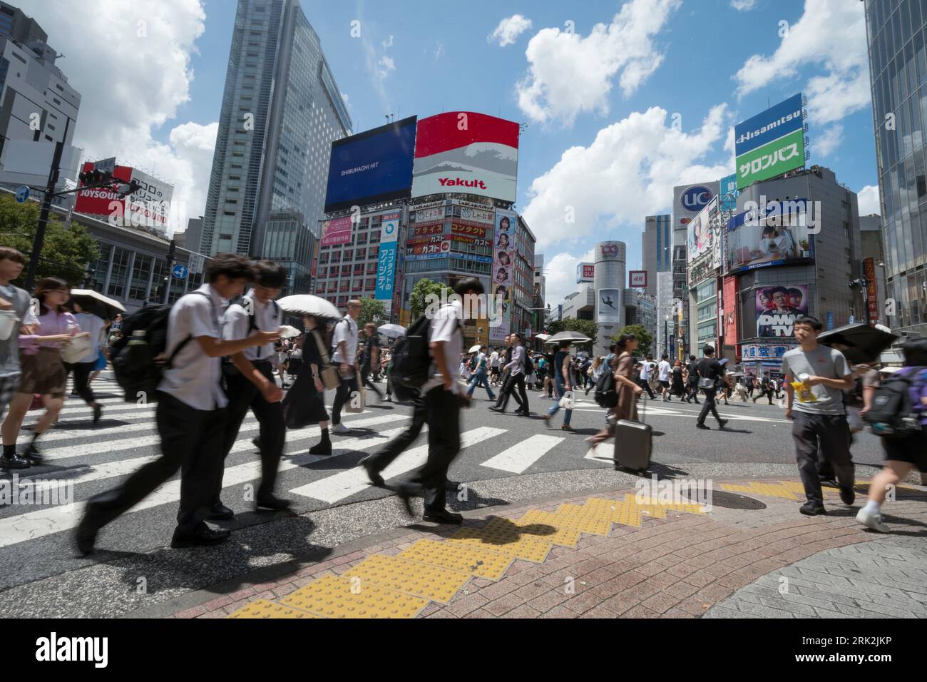 Traffic stops to let pedestrians cross in all directions at the famous ...