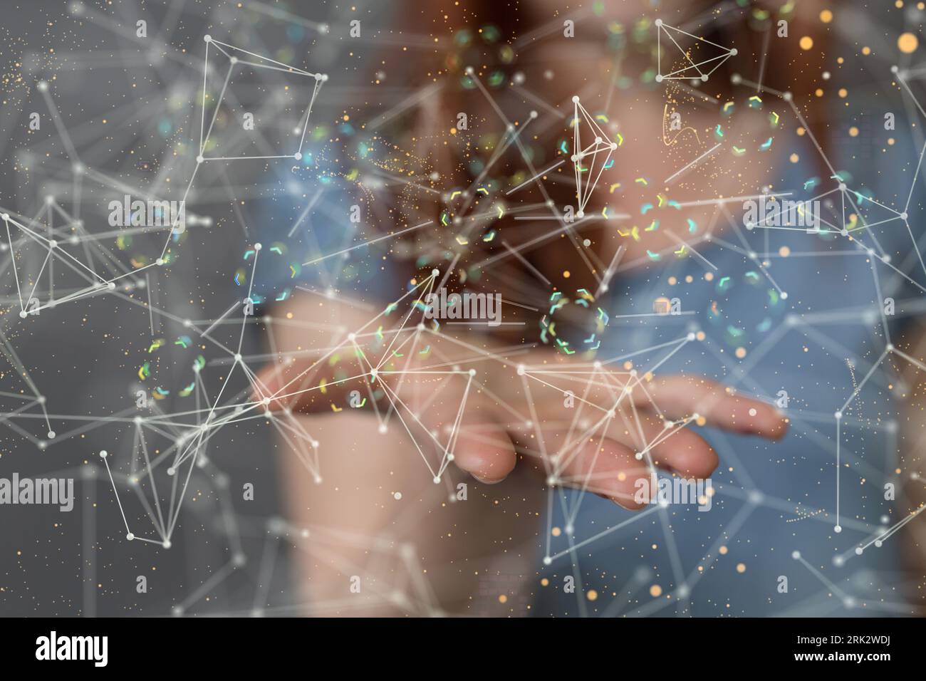 A young female showing a network of data with connecting dots Stock ...
