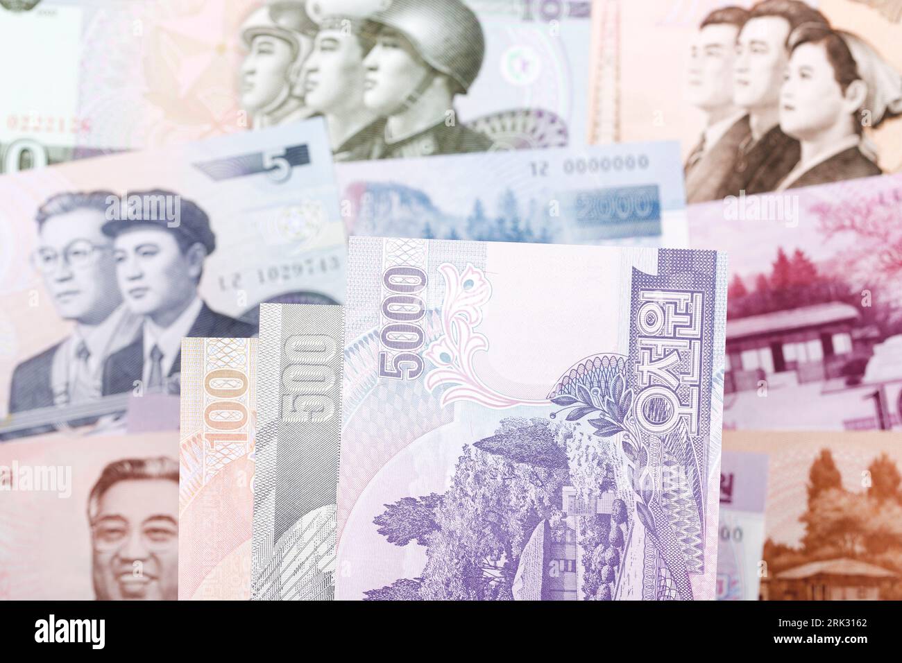 North Korean money - won a business background Stock Photo - Alamy