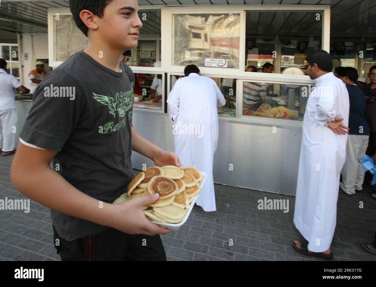 Arabic boy doha hi-res stock photography and images - Alamy