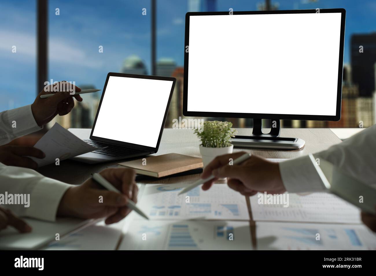 young man working Businessman using a desktop computer of the blank ...