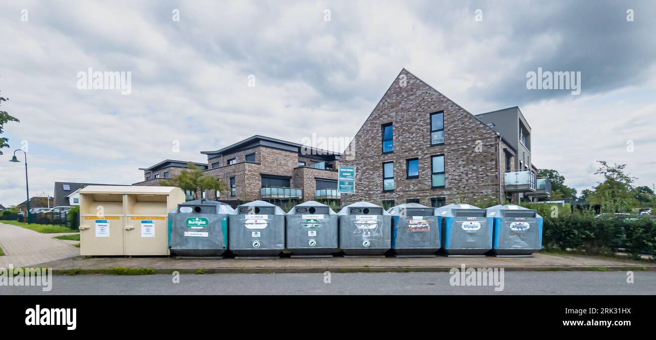 Bargtheide, Germany. 05th Aug, 2023. Recycling containers for glass, paper and used clothing are ...