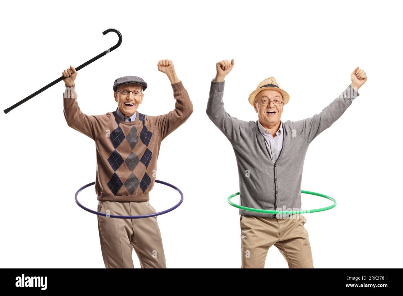 Happy elderly men spinning hula hoops isolated on white background ...