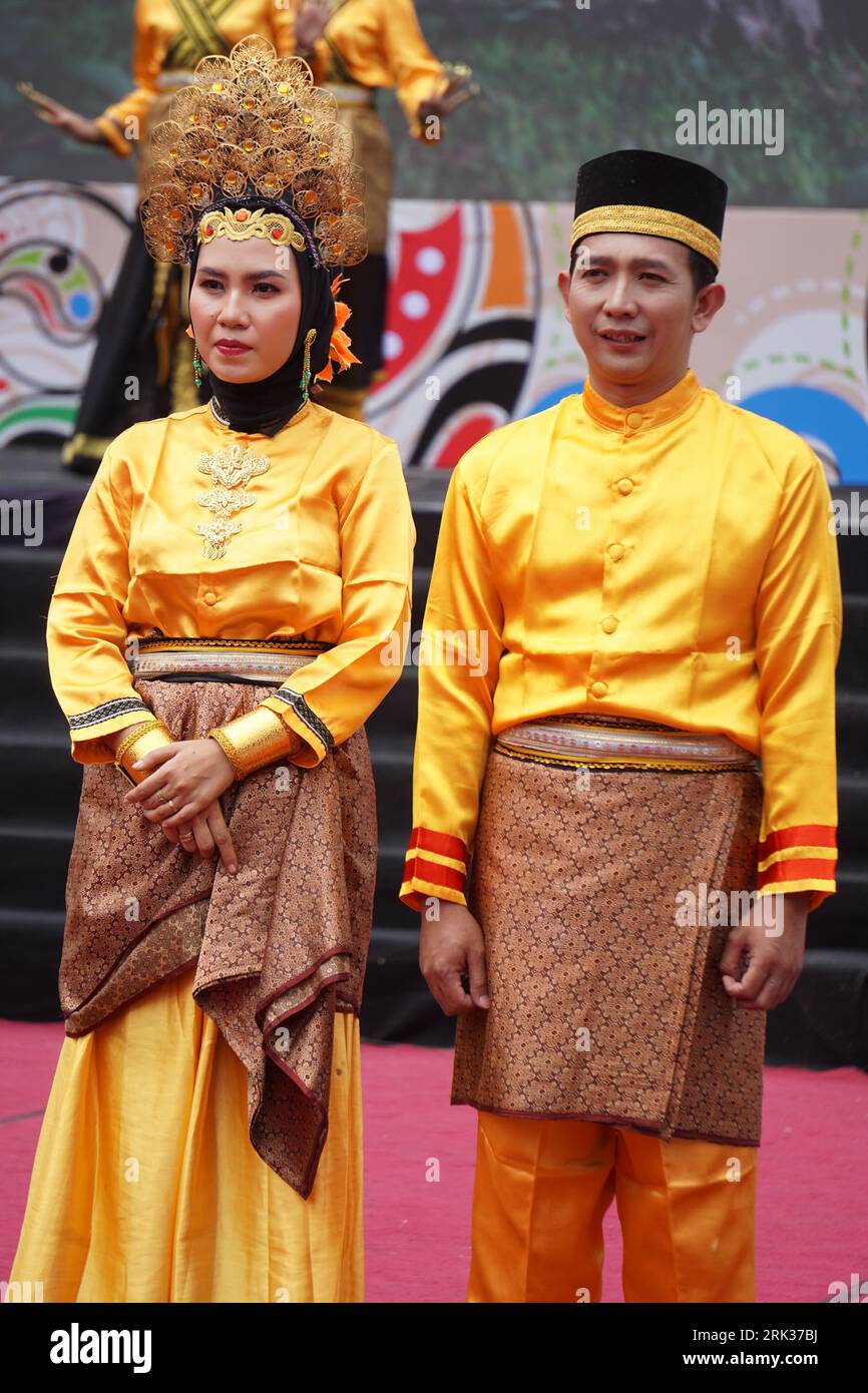 Indonesian with a traditional costume from Riau at BEN Carnival Stock ...