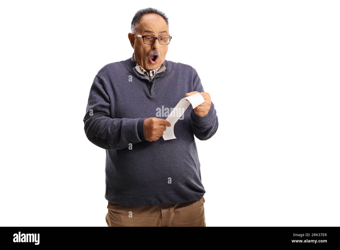 Shocked mature man looking at a bill isolated on white background Stock ...