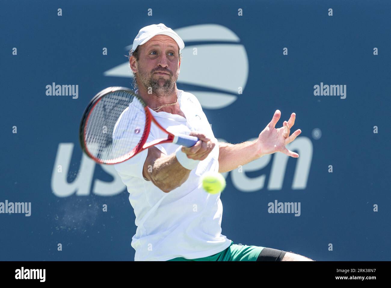 Tennys Sandgren of USA returns ball during 1st round match against ...