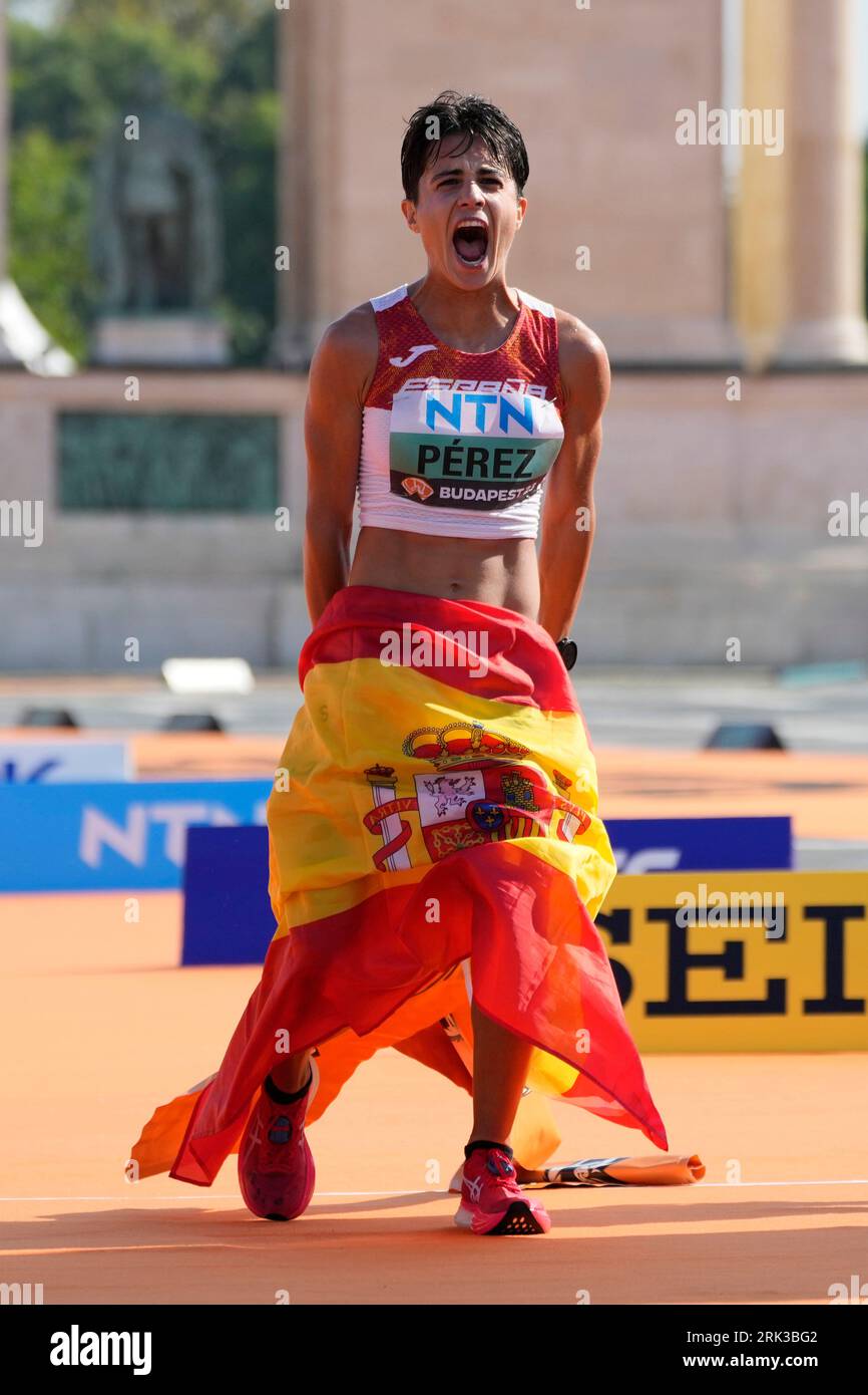 María Perez, of Spain, celebrates as she crosses the finish line to win ...