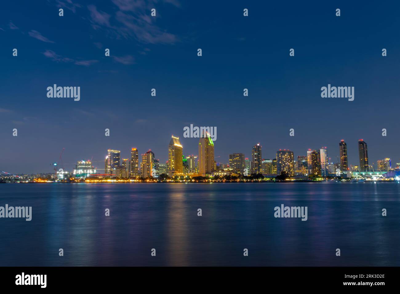 San Diego skyline at night with water colorful reflections, view from ...