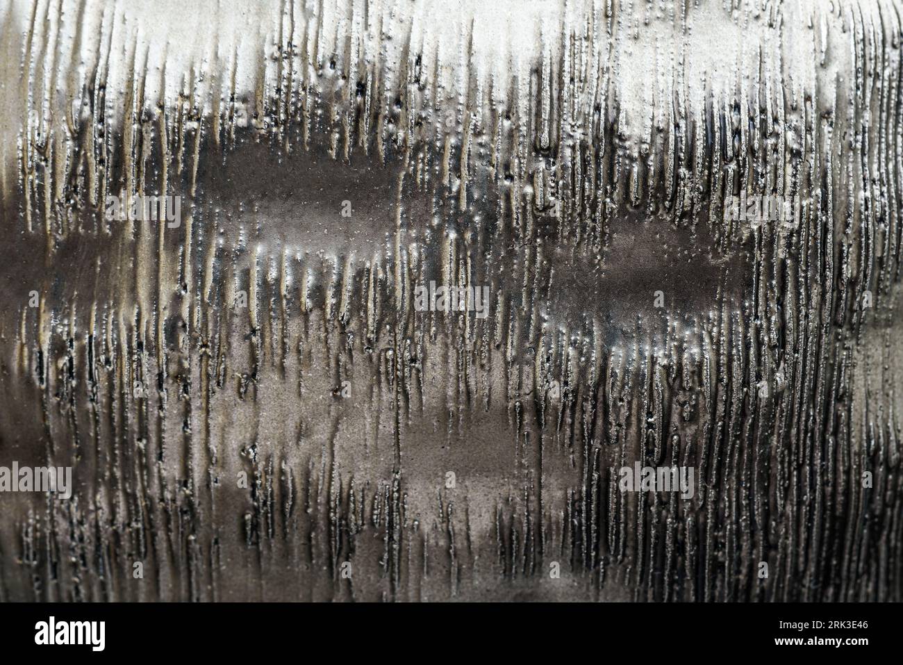 Monochrome texture of shiny grained metal. Abstract background for ...