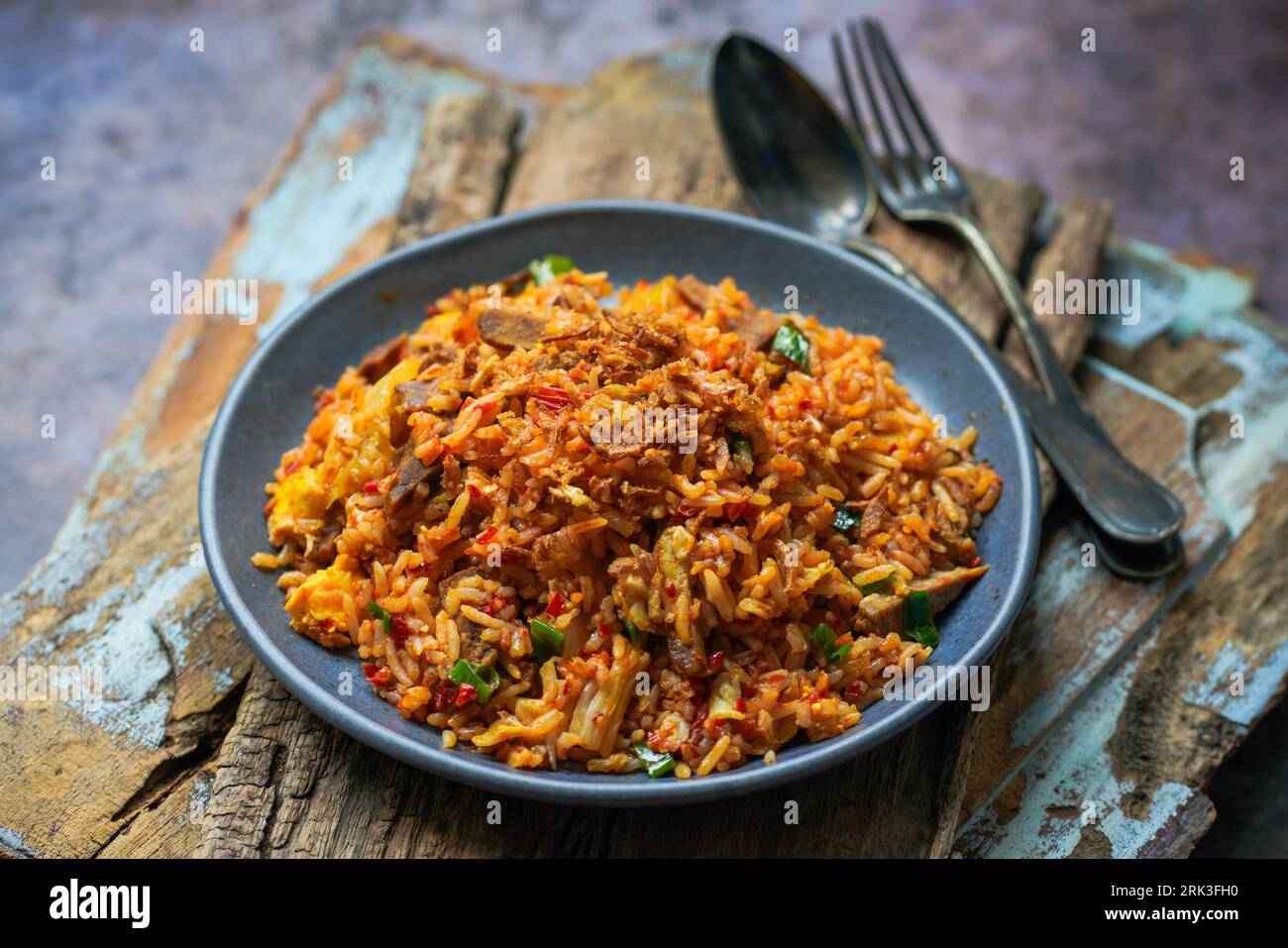 Nasi goreng rendang, Indonesian fried rice with beef rendang Stock ...