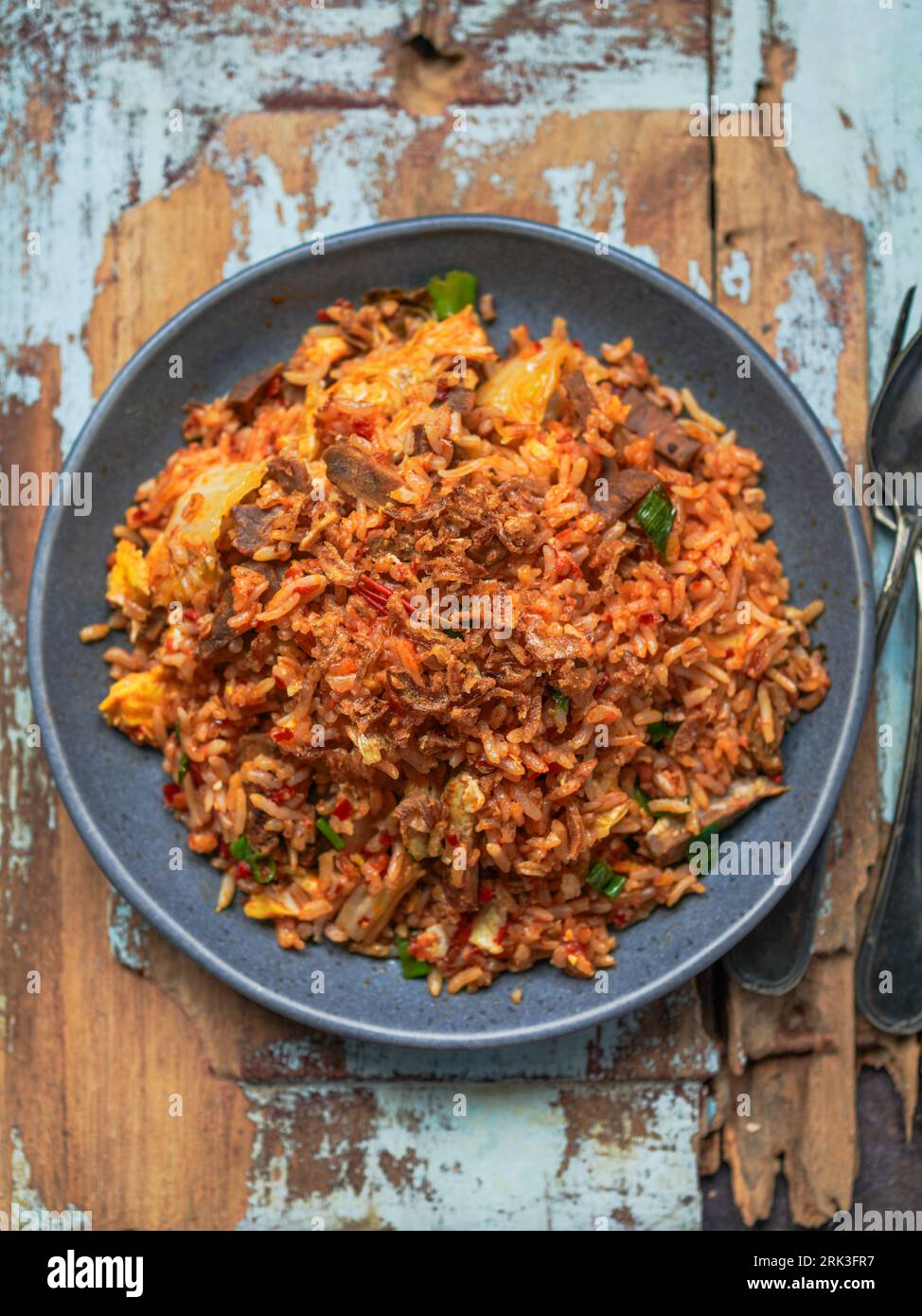 Nasi goreng rendang, Indonesian fried rice with beef rendang Stock ...