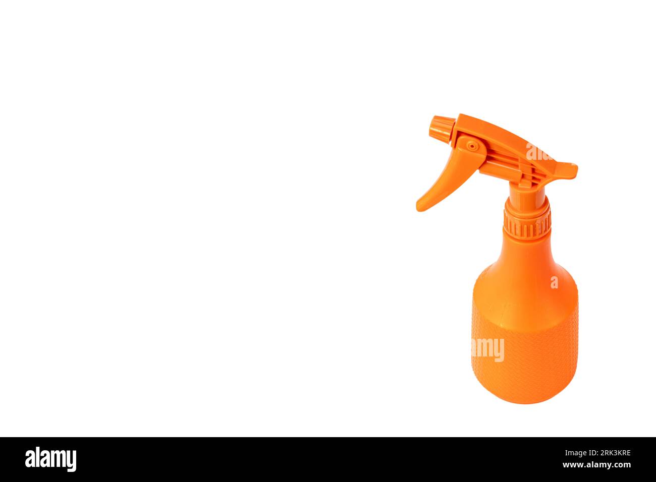 Orange spray bottle on white background Stock Photo - Alamy
