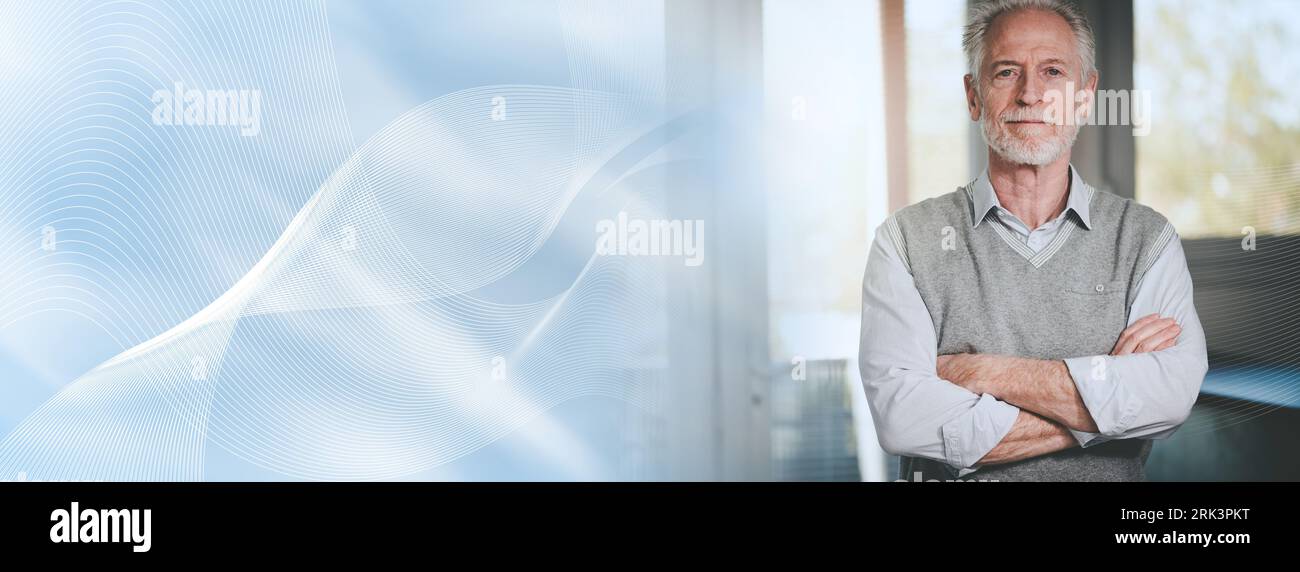 Portrait of senior businessman with arms crossed; panoramic banner ...