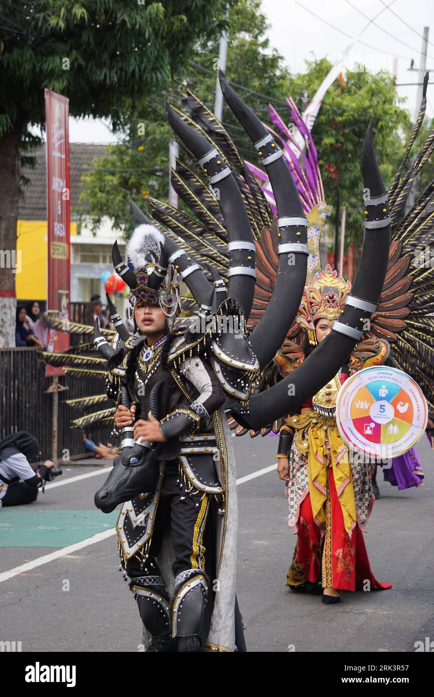Indonesian with an exotic costume at BEN Carnival Stock Photo - Alamy