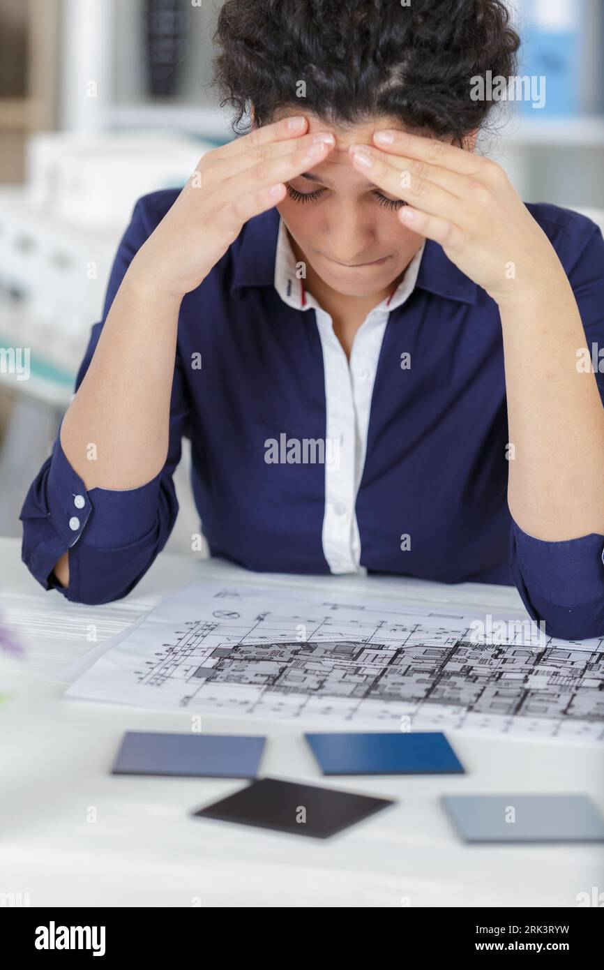 a female architect feeling stress Stock Photo - Alamy