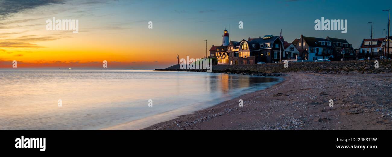 Urk Flevoland Netherlands sunset at the lighthouse and harbor of Urk ...